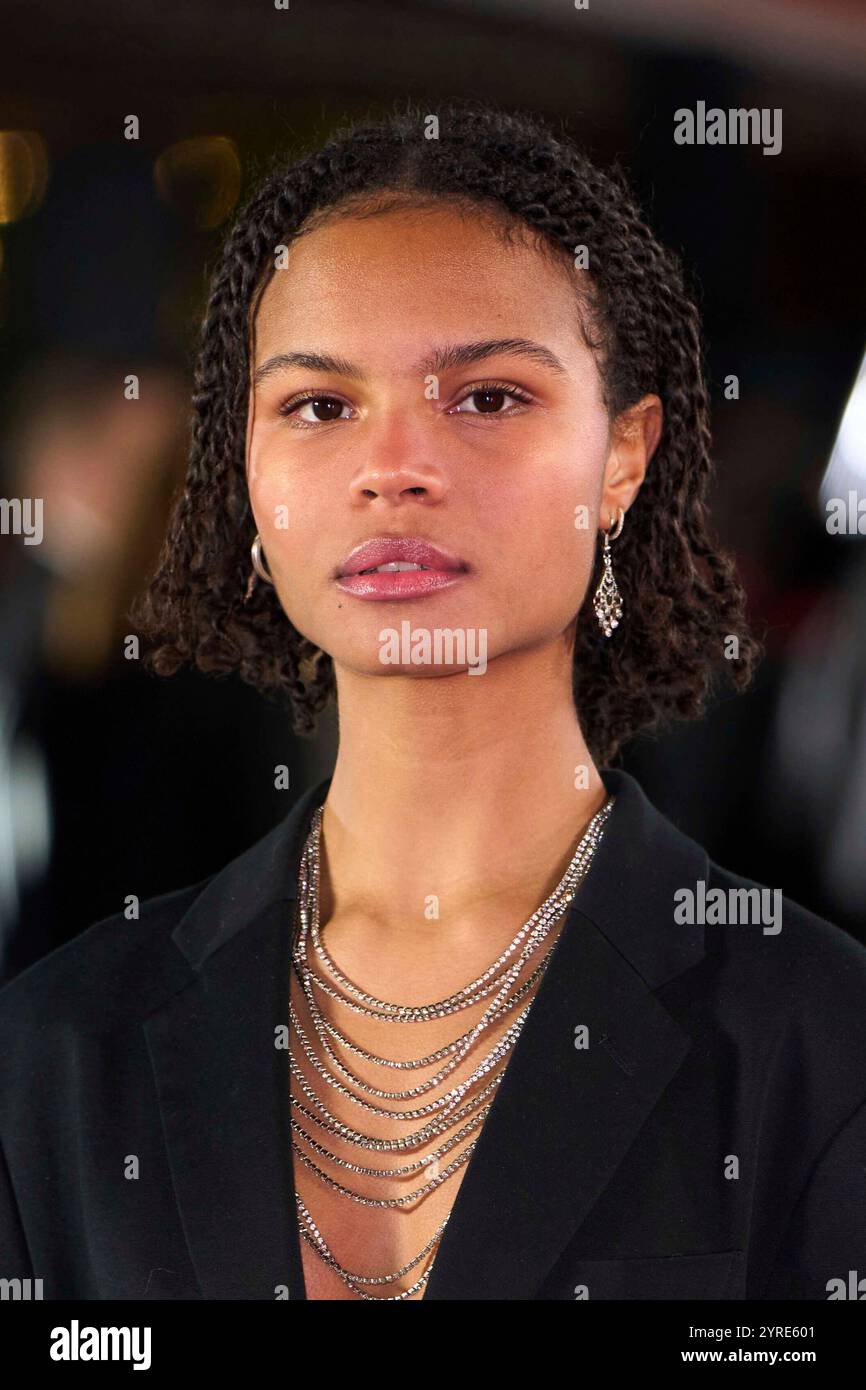 Indeyarna Donaldson-Holness poses for photographers upon arrival for ...