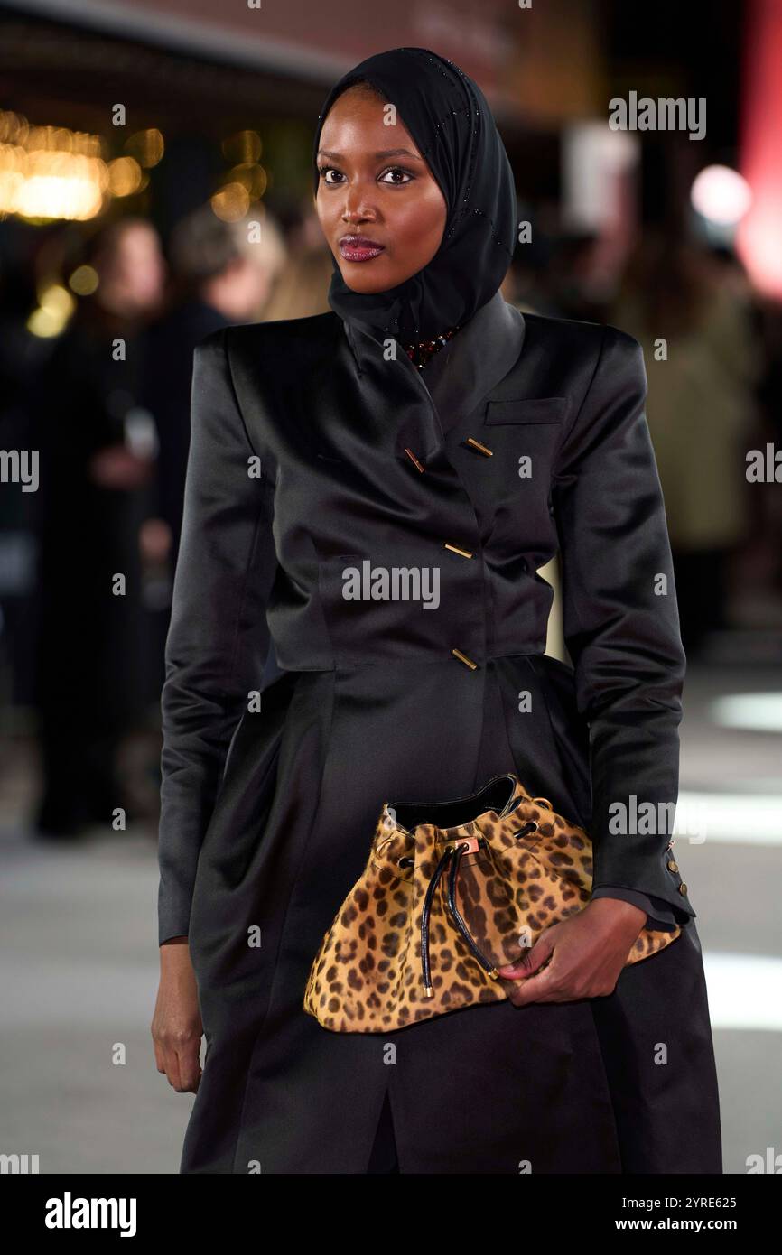 Fadhi Mohamed poses for photographers upon arrival for the premiere of ...