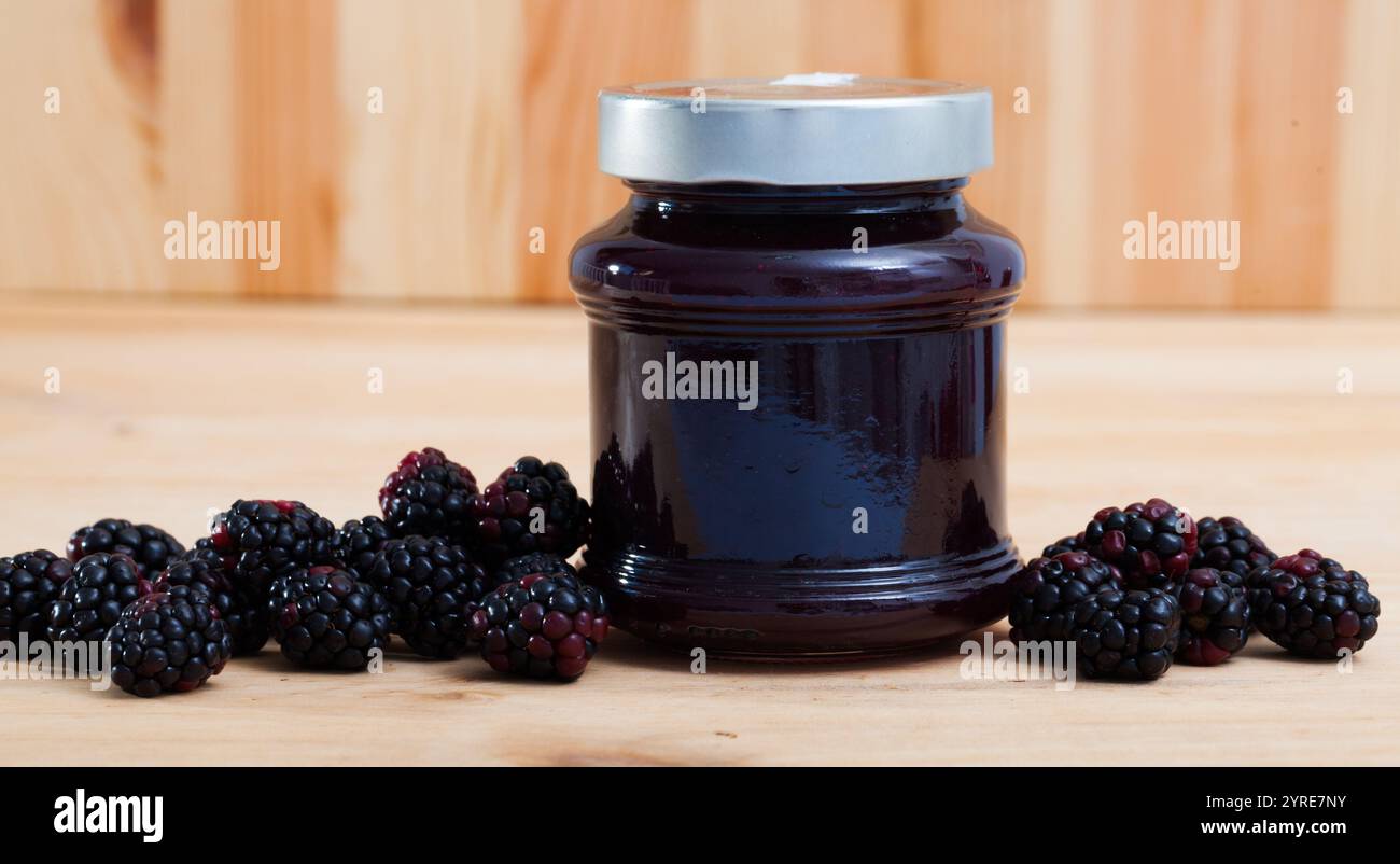 Blackberry jam in closed glass jar Stock Photo - Alamy