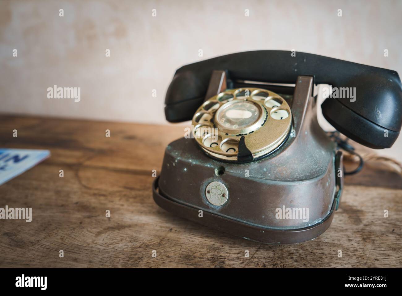 Vintage Rotary Dial Telephone on Rustic Wooden Surface Stock Photo - Alamy