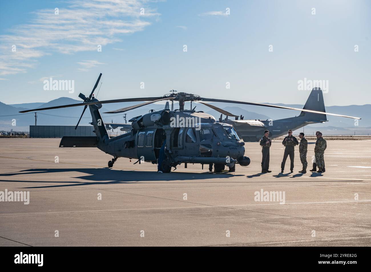 Members of the 58th Special Operations Wing prepare a HH-60G Pave Hawk helicopter for its final ...