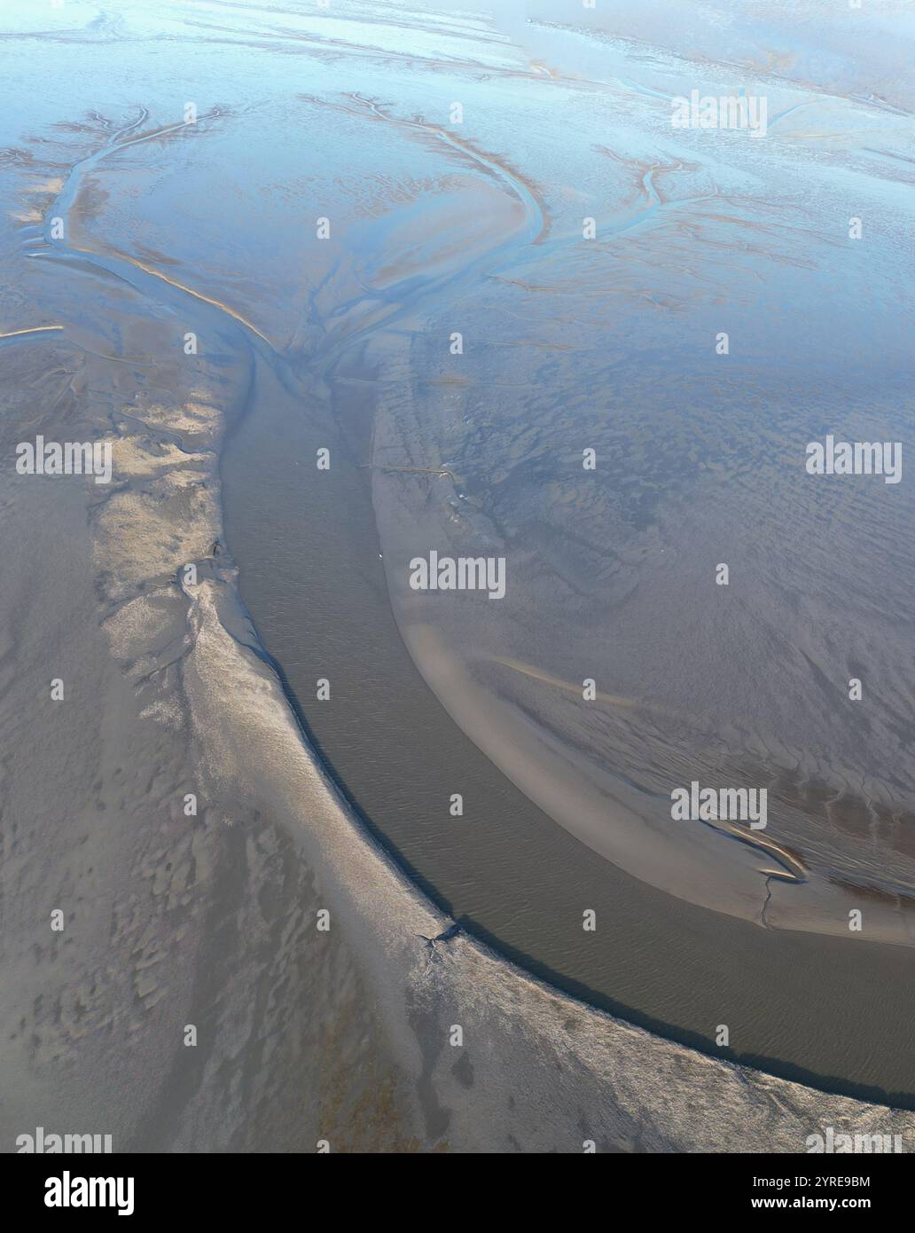 Aerial view of the tidal mudflats and channels of the Eemsdelta ...