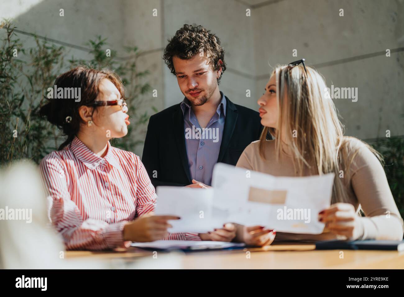 Multicultural business team in a collaborative meeting discussion Stock ...