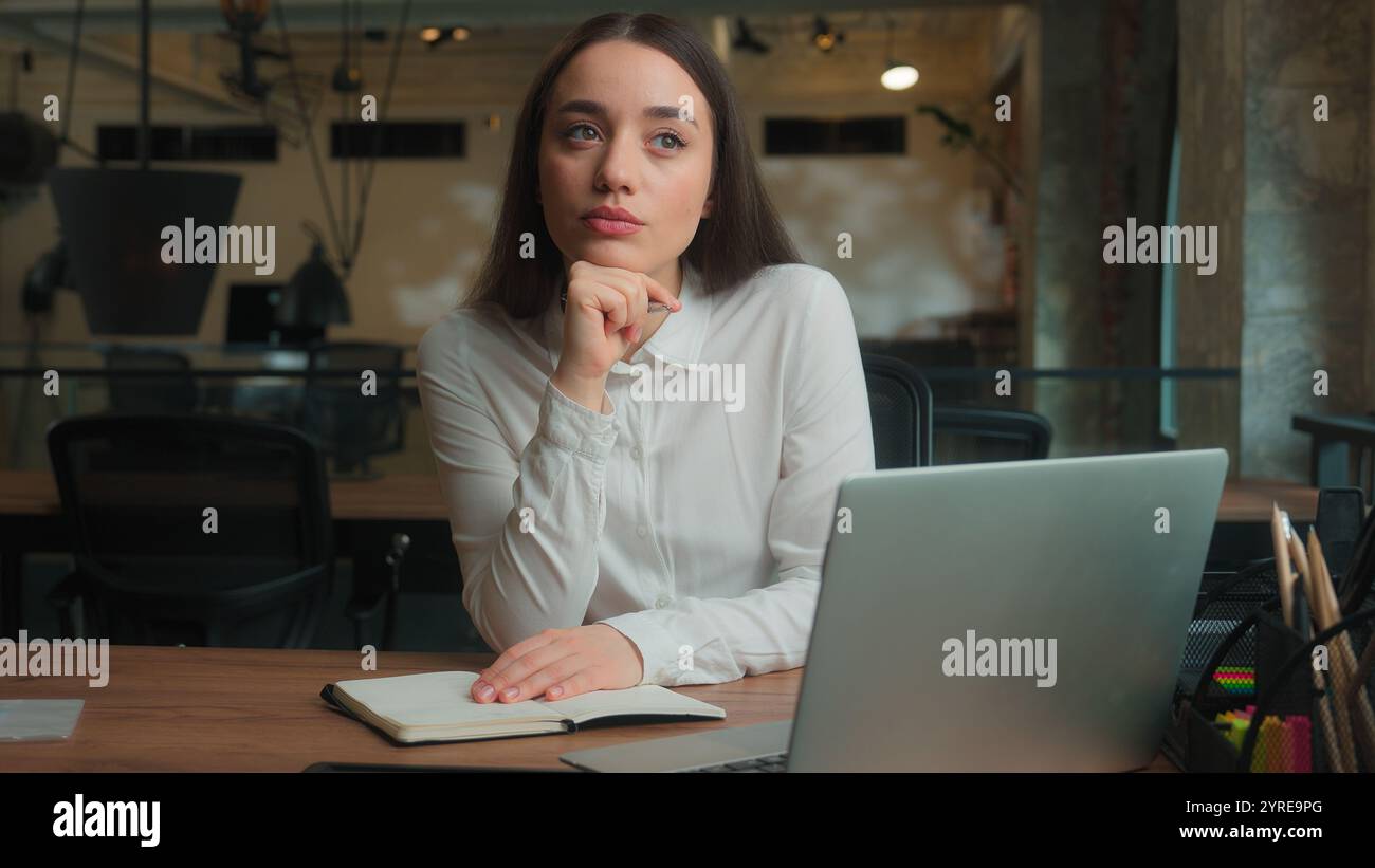 Pensive thoughtful Caucasian business woman puzzled businesswoman ...