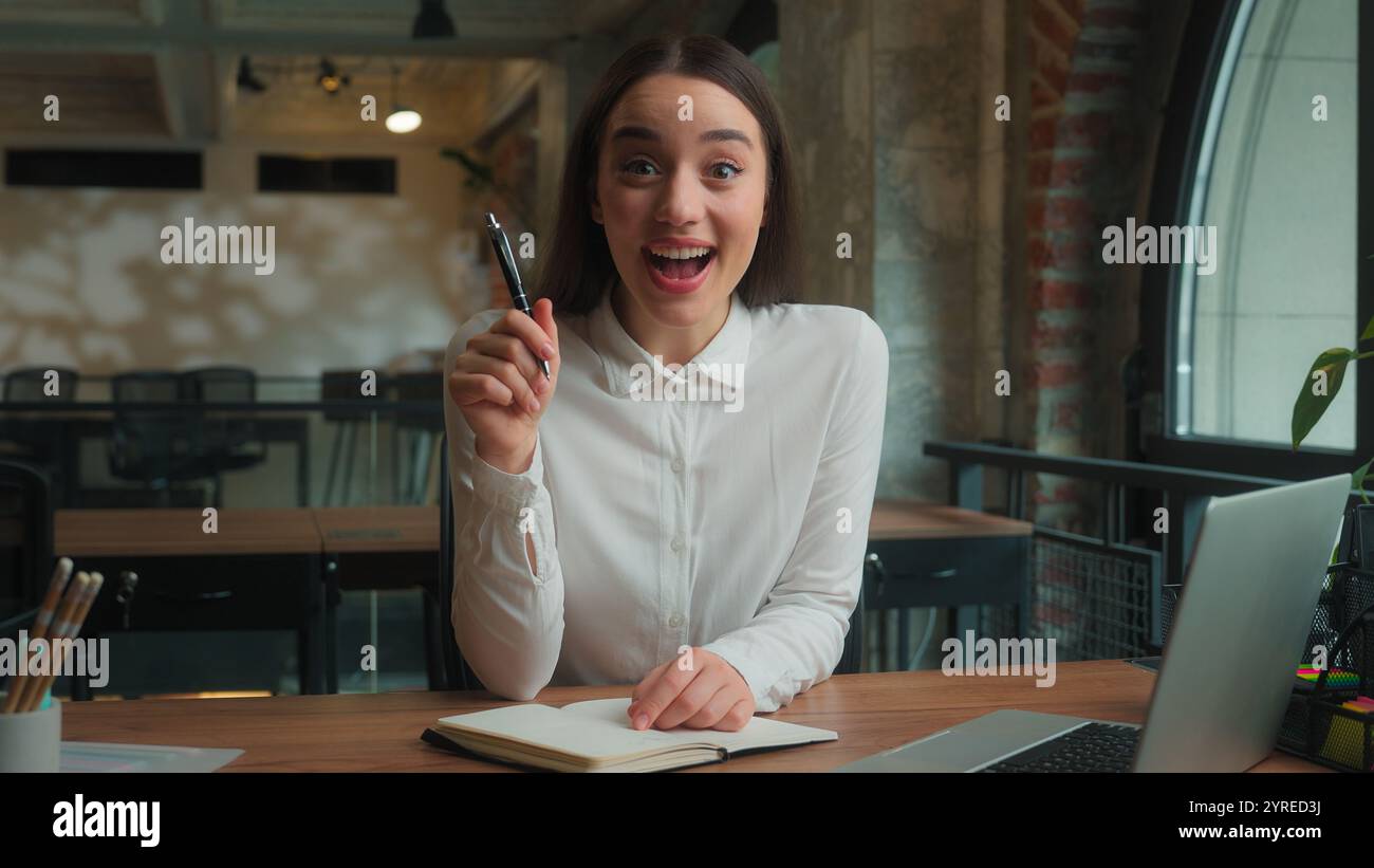 Pensive female writing notes hi-res stock photography and images - Alamy