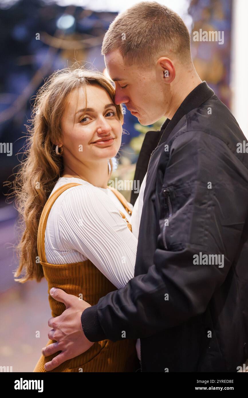 Romantic Embrace of a Couple in a Cozy Setting Stock Photo - Alamy