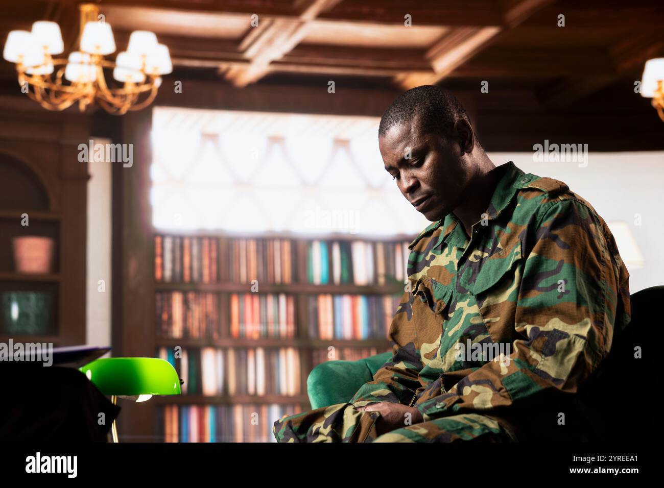 Female psychologist assists a black soldier in a counseling session ...
