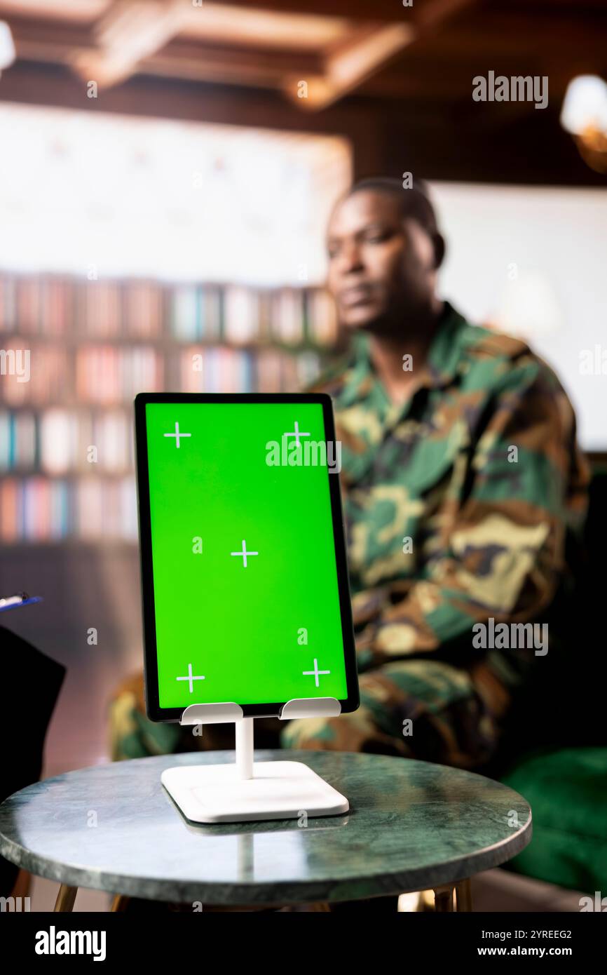 African american serviceman next to green screen suffering from post ...