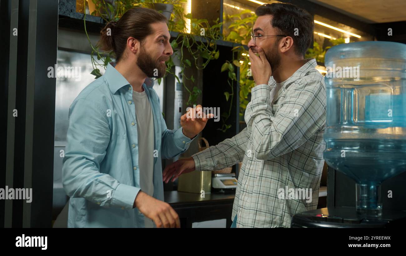 Coworkers gossiping on coffee break hi-res stock photography and images ...