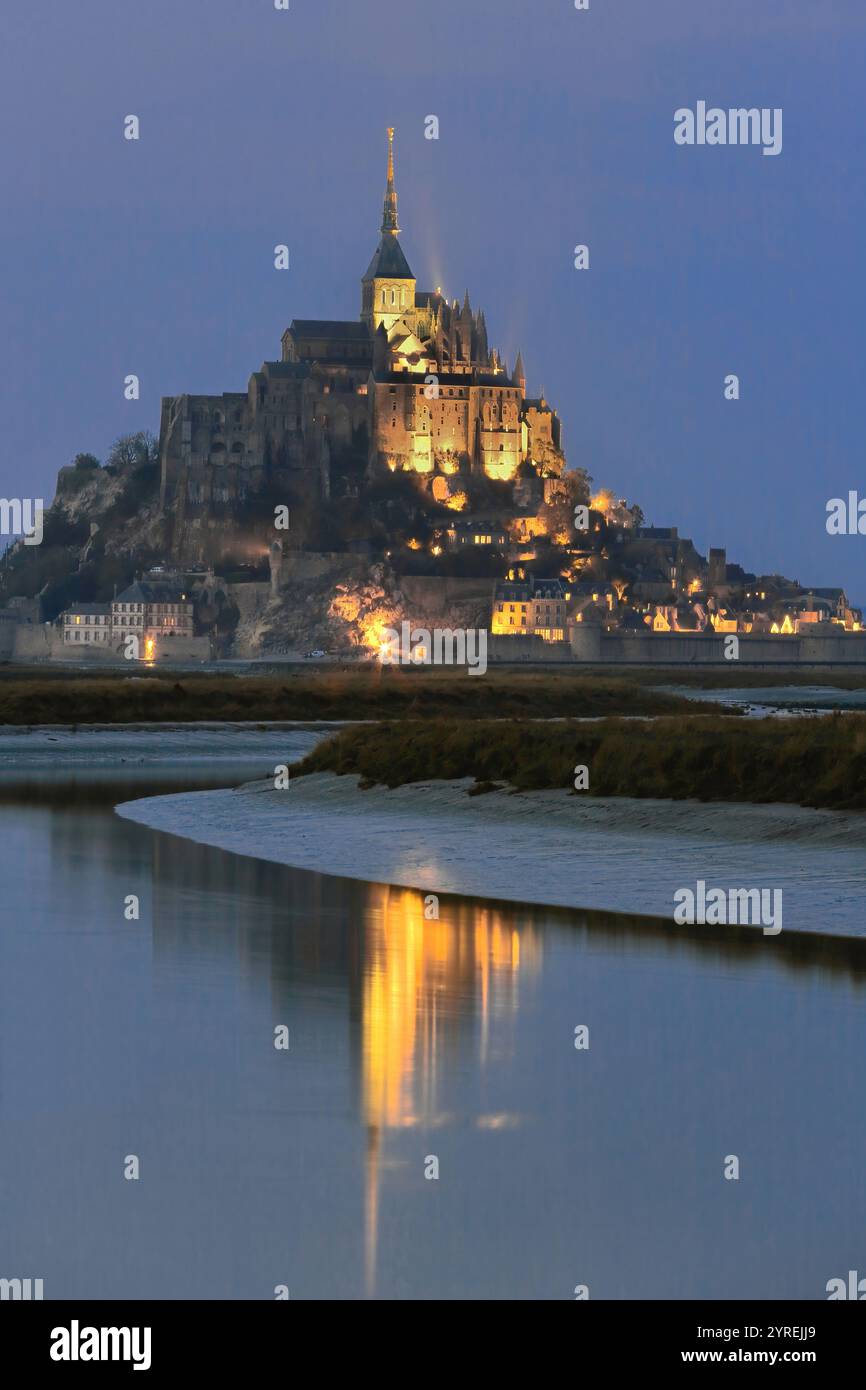 080 Le Mont-Saint-Michel abbey at dusk on a tidal island of the ...