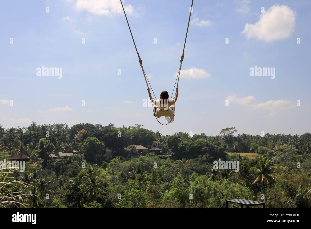 Tourist plays on swing hi-res stock photography and images - Alamy