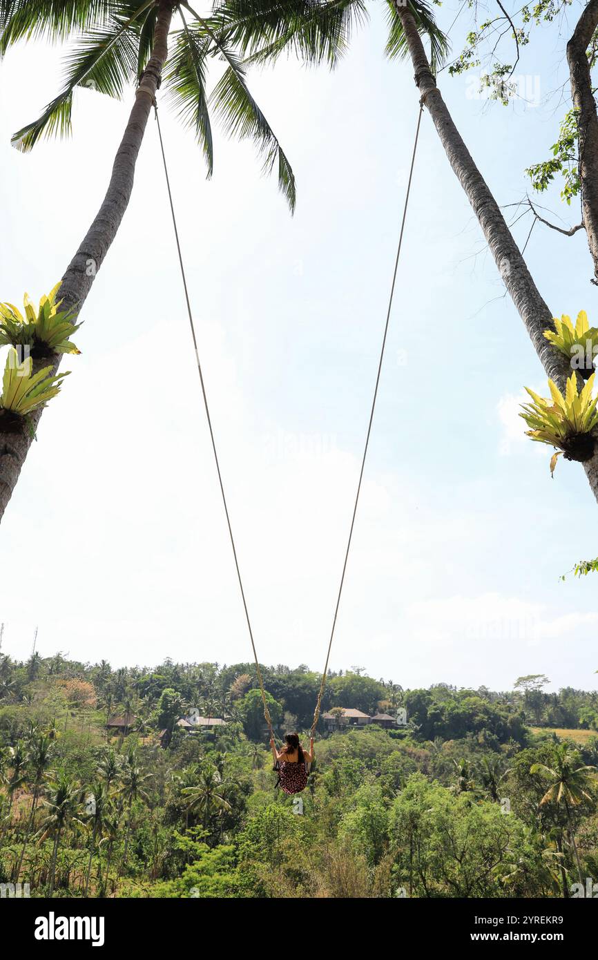 Tourist plays on swing hi-res stock photography and images - Alamy