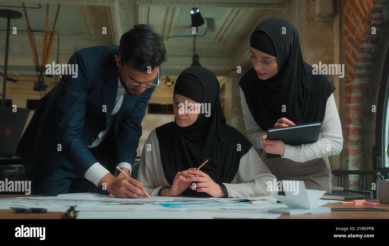 Arabian business man muslim women in hijab teamwork architecture ...