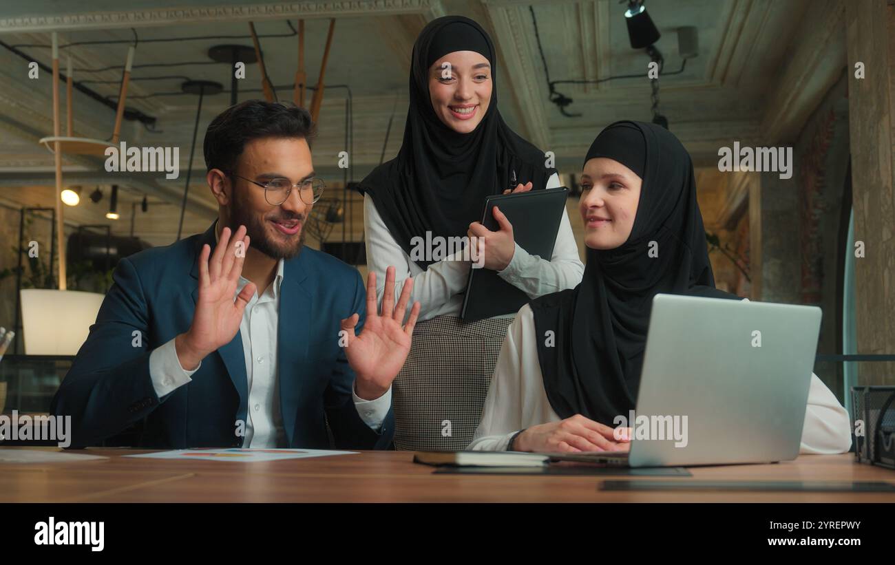 Friendly business team office colleagues employees Arabian man muslim ...