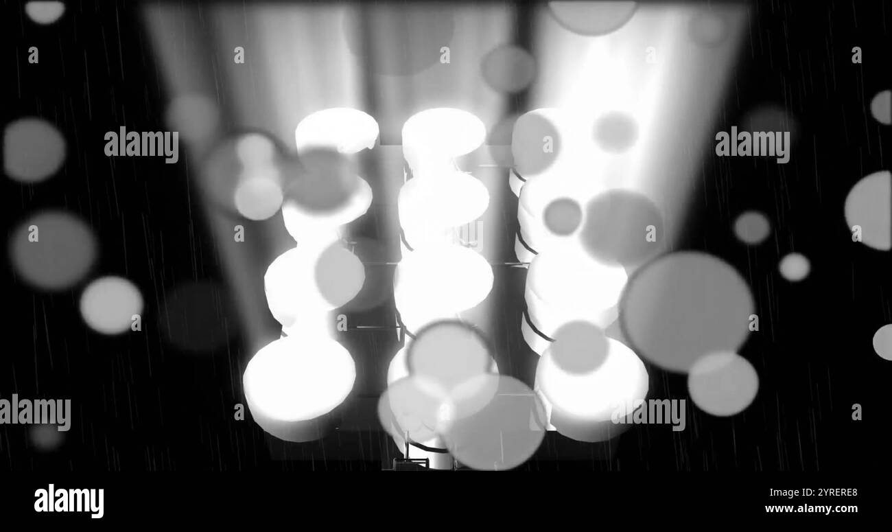 Image of glowing spots of light on dark background Stock Photo - Alamy