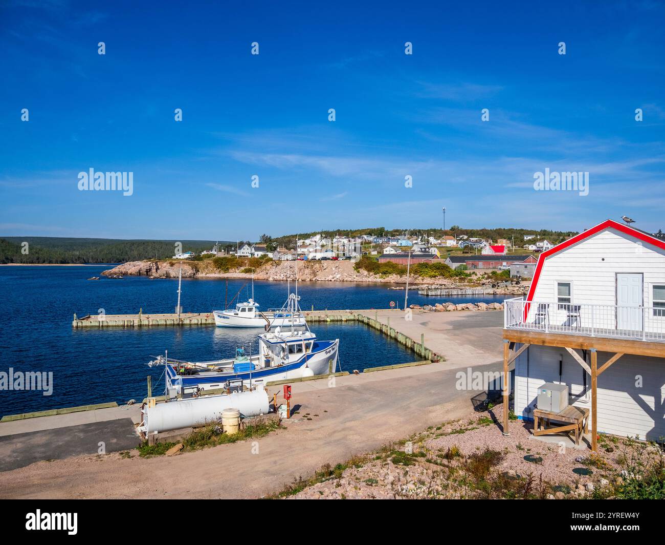 Fishing boats in the marina in Neils Harbor on the Cabot Trail on Cape ...