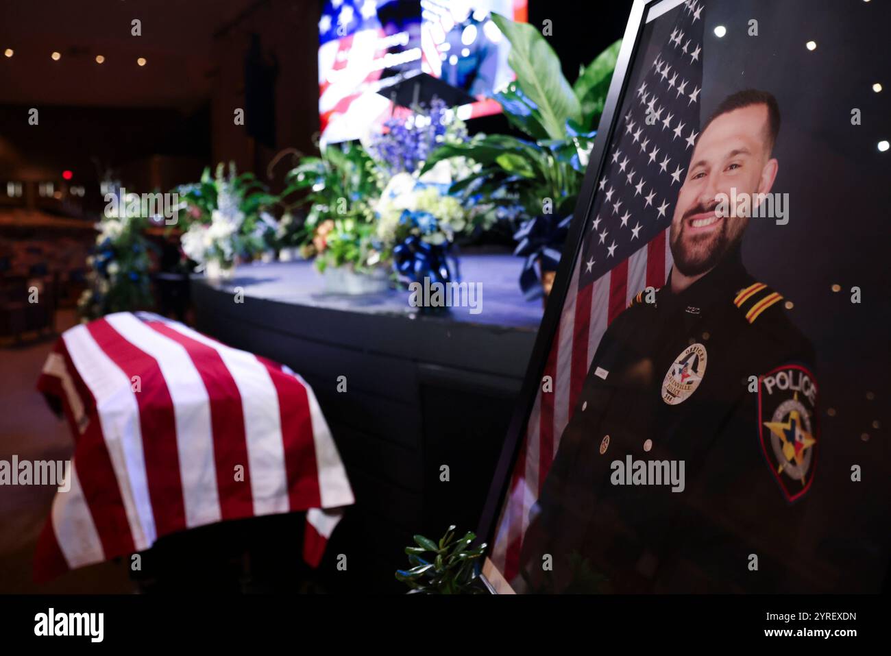 The casket of Greenville police officer Cooper Dawson remains inside ...
