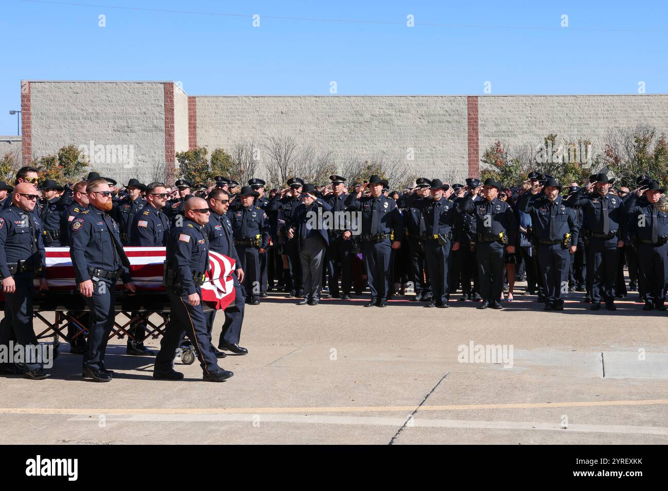 The casket of Greenville police officer Cooper Dawson is carried by law ...