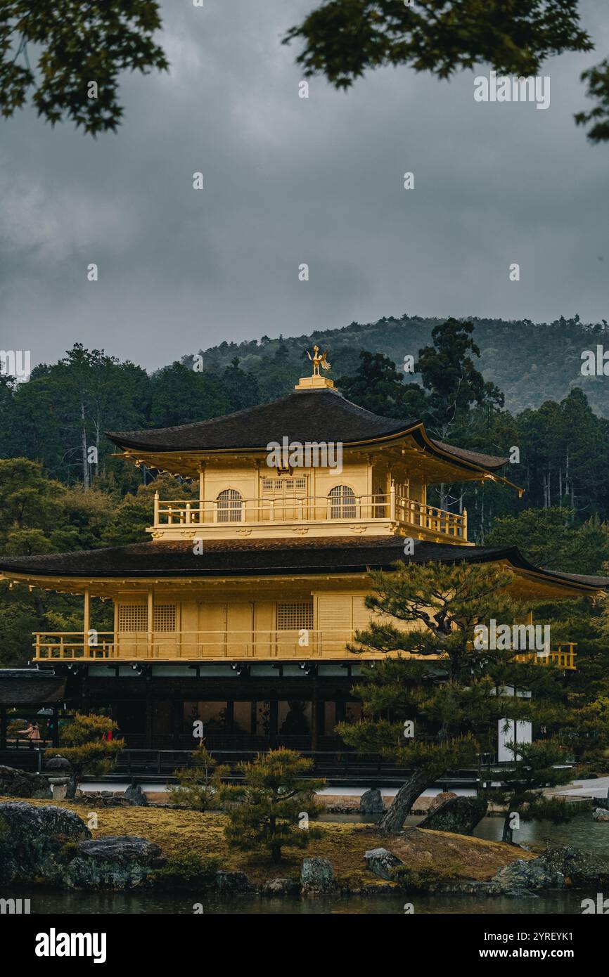 The Temple of the Golden Pavilion in Kyoto, known as Kinkaku-ji, stands ...