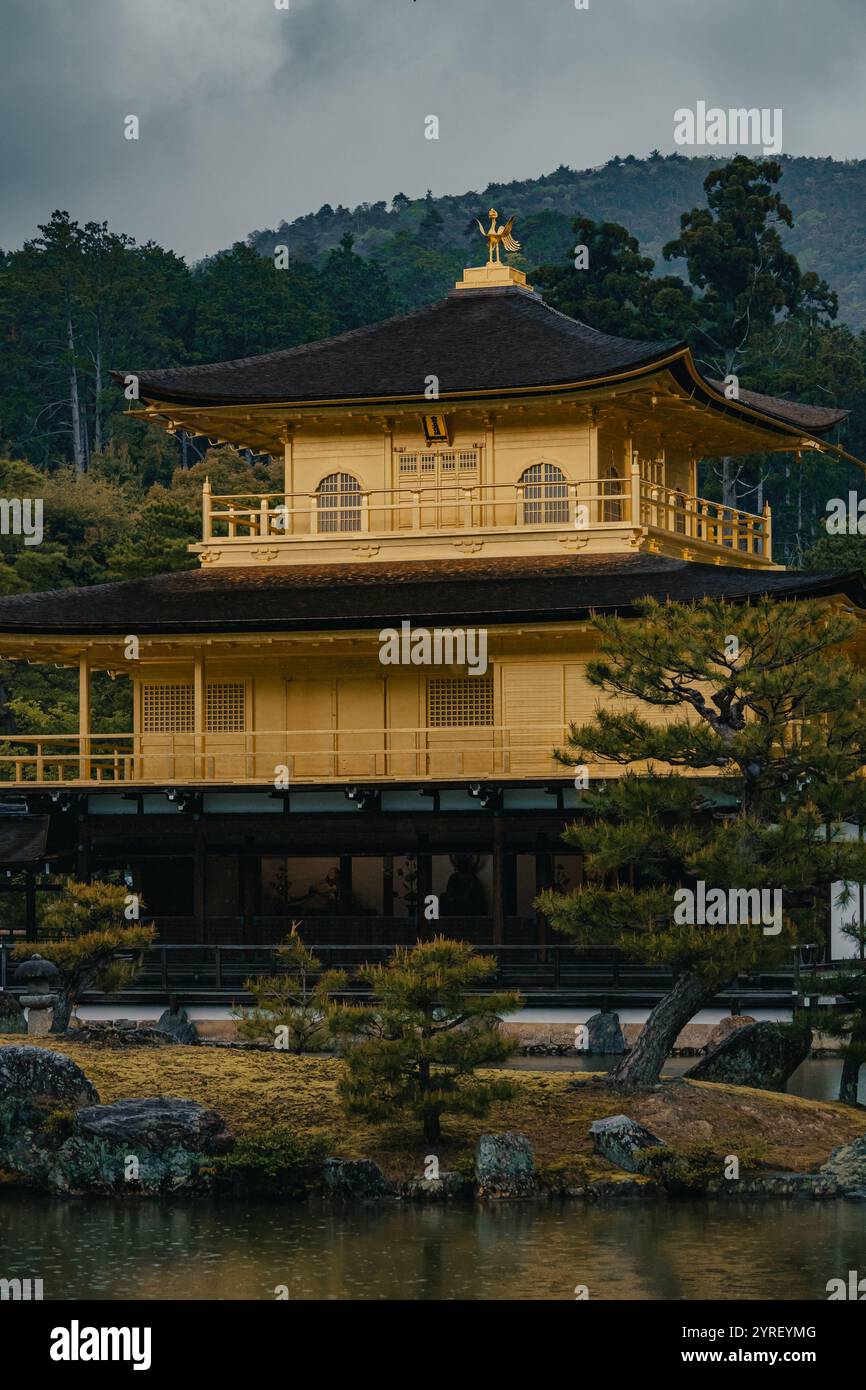 The Temple of the Golden Pavilion in Kyoto, known as Kinkaku-ji, stands ...