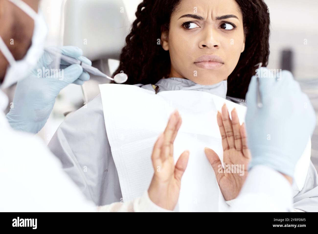 Portrait Of Scared Black Female Patient During Check Up With Dentist ...