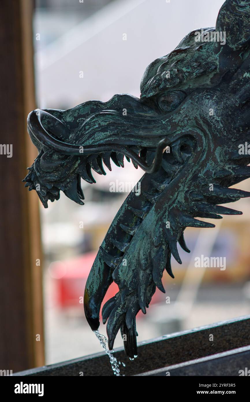 Dragon shaped purification water fountain in Higashi Honganji temple of ...