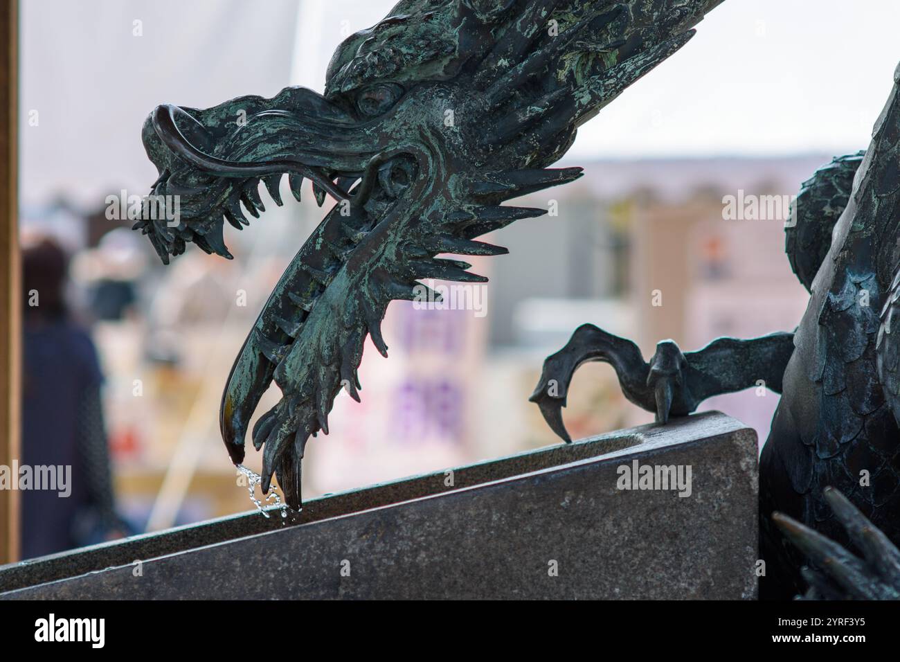 Dragon shaped purification water fountain in Higashi Honganji temple of ...