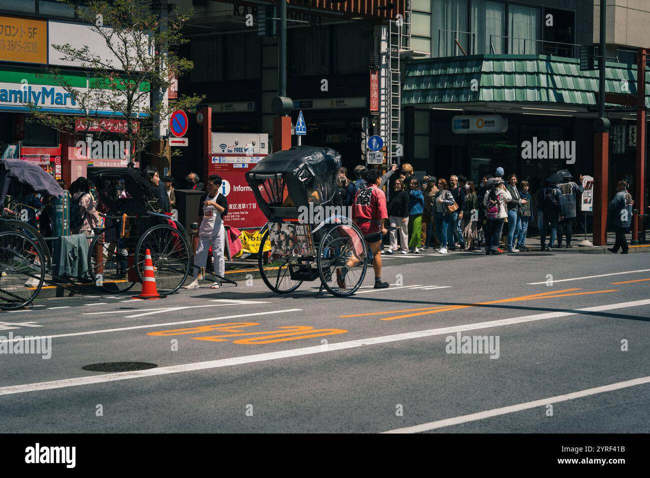 A traditional rickshaw ride in Asakusa, Tokyo, showcasing the blend of ...