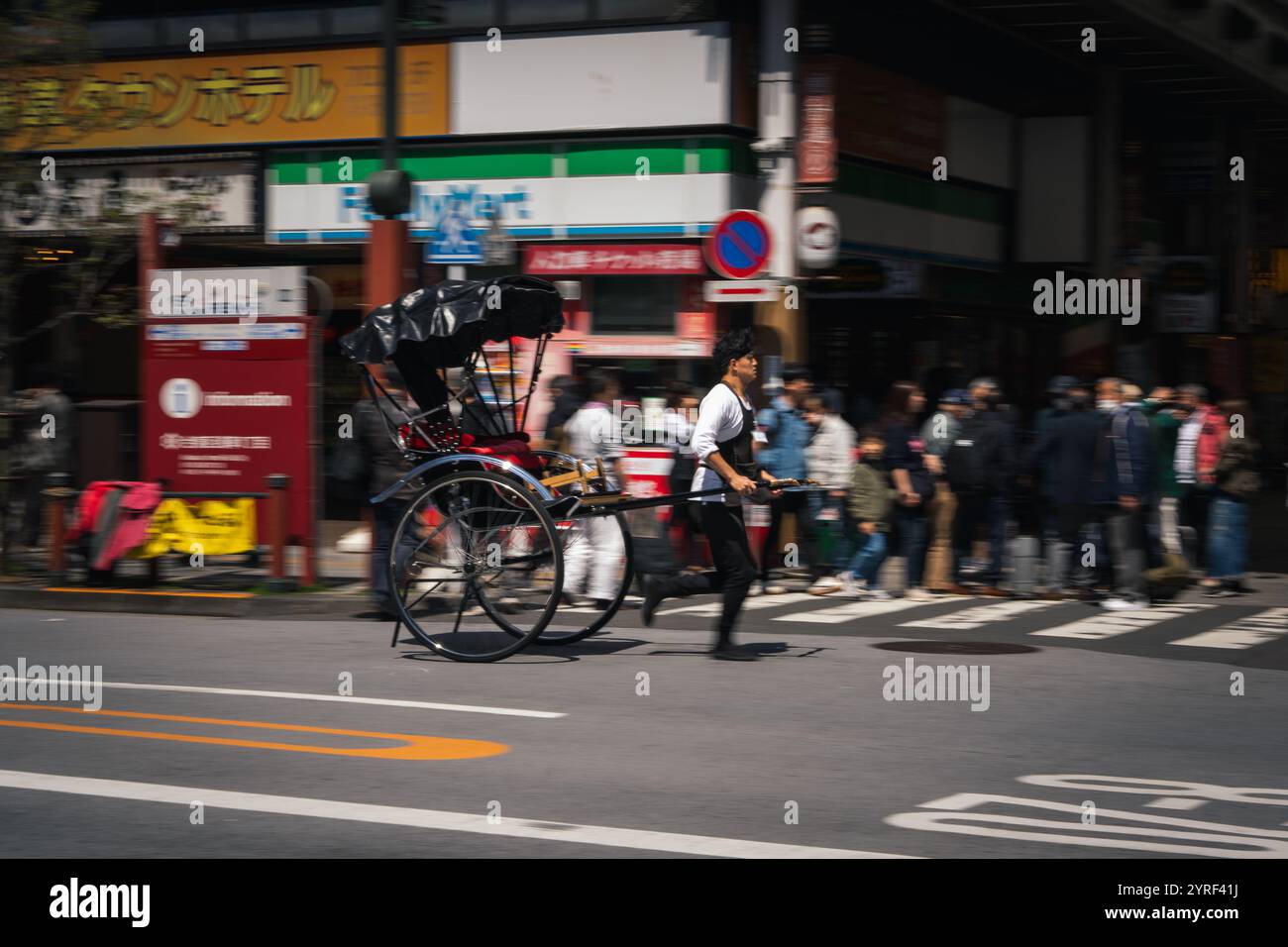 A traditional rickshaw ride in Asakusa, Tokyo, showcasing the blend of ...