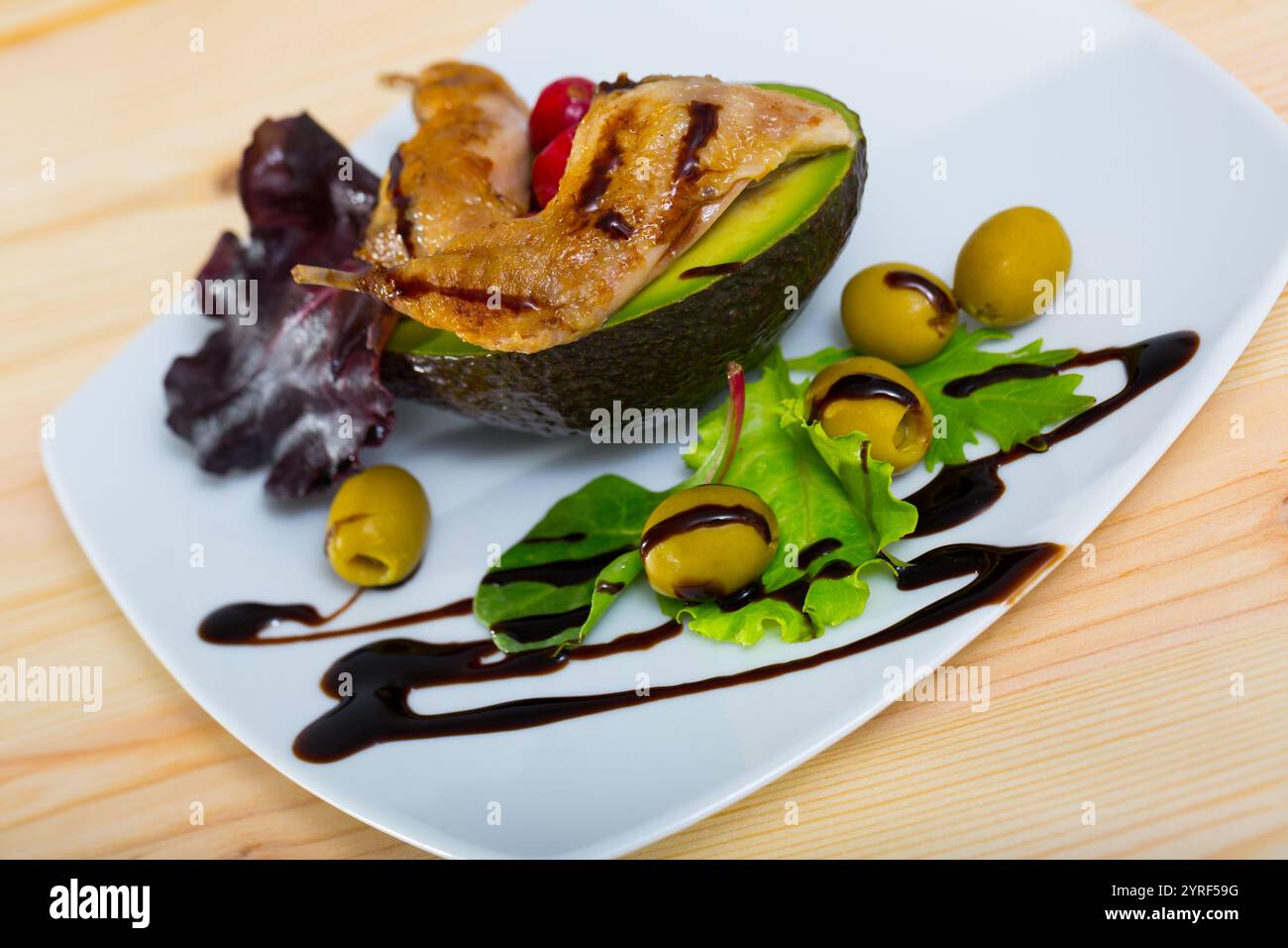 Grilled quail leg quarters with vegetables and balsamic Stock Photo - Alamy