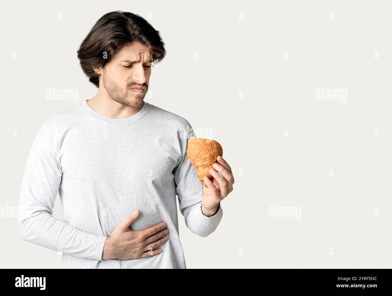 Pain after eating hi-res stock photography and images - Alamy