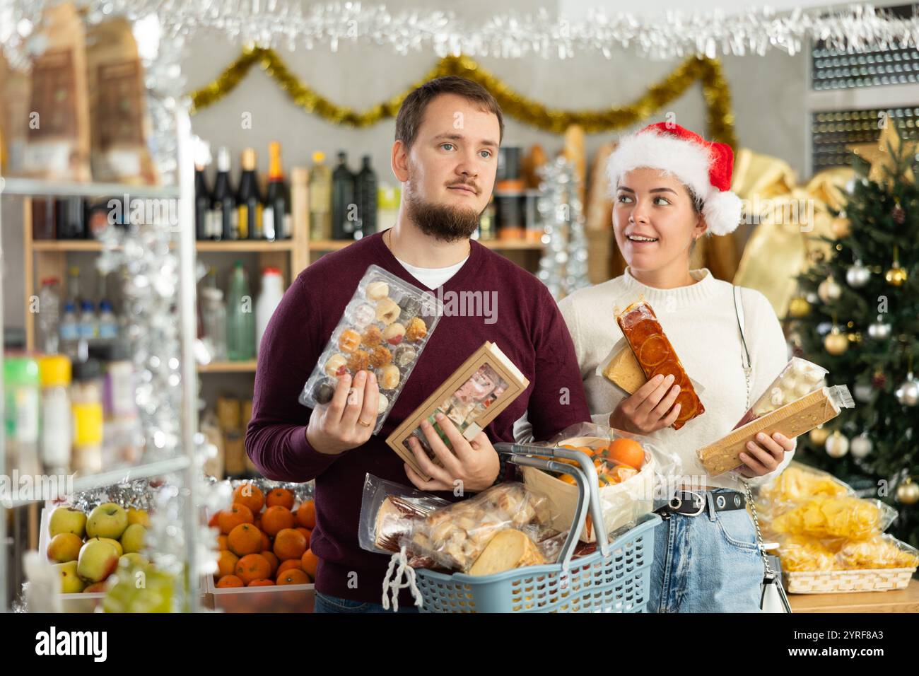 Man woman choose sweets hi-res stock photography and images - Alamy