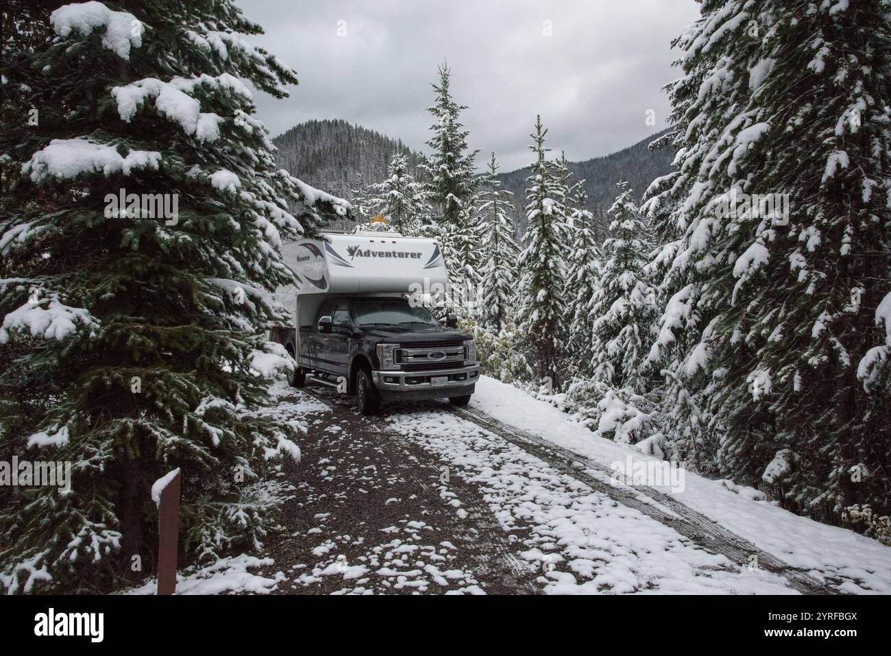 Truck camper parking in winter conditions in Hampton Campground in ...