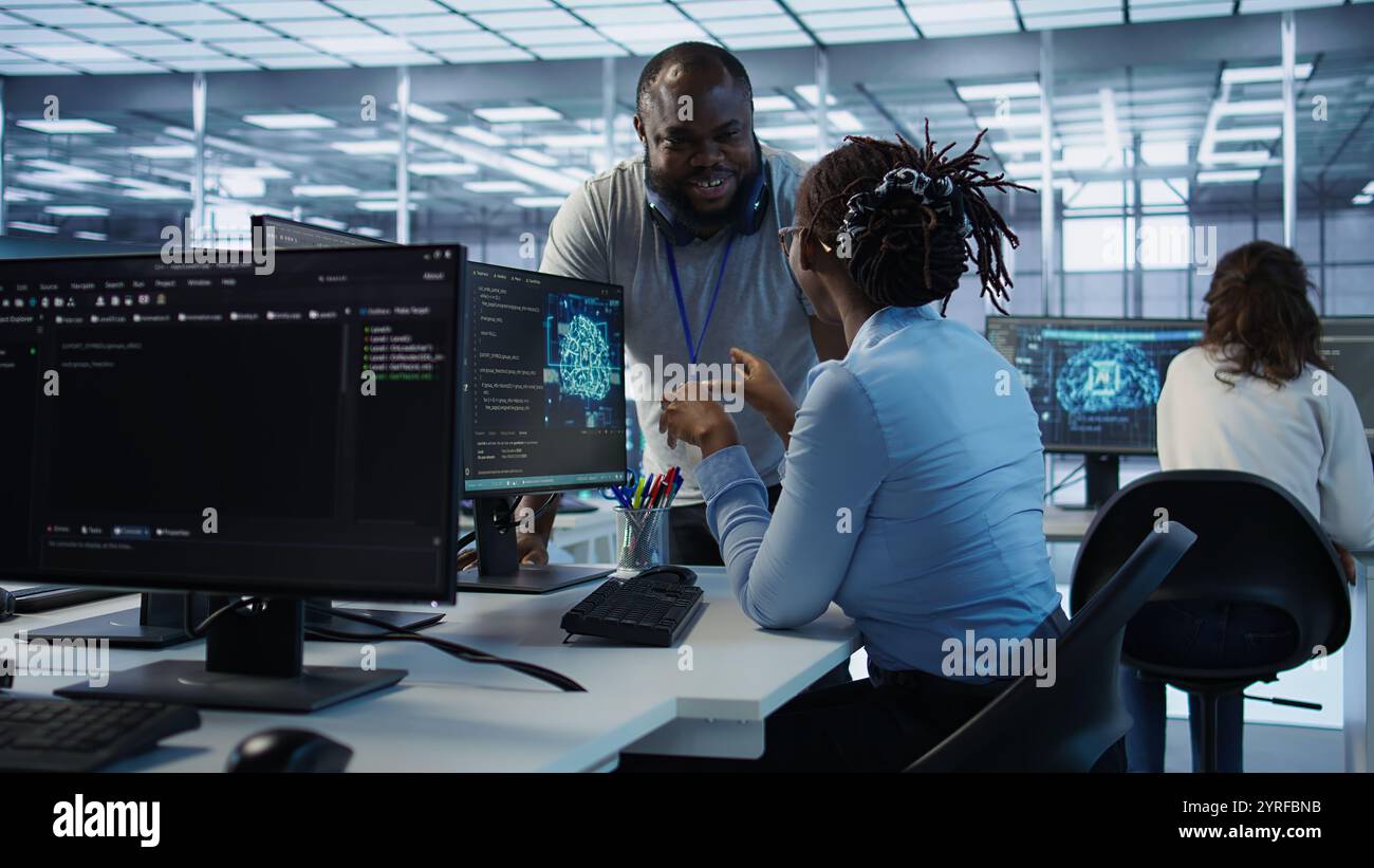 Engineers overseeing server room hi-res stock photography and images - Alamy
