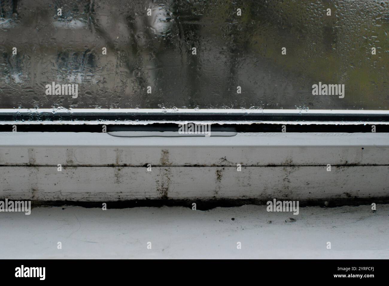 A mold fungus appears on the plastic window due to water Stock Photo ...
