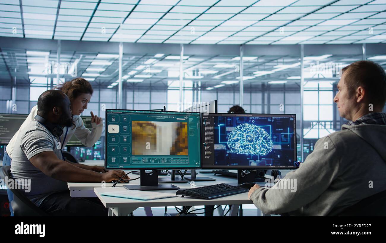 Computer scientist in server room making software producing AI generated videos. IT specialist ...