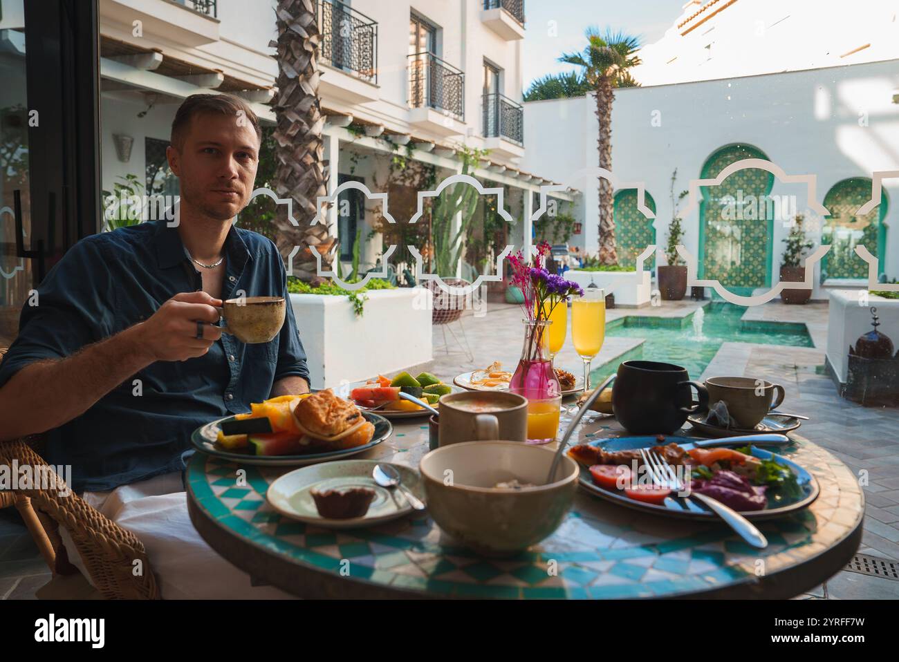 Breakfast Setting at Marrakech Style Boutique Hotel Courtyard Stock ...