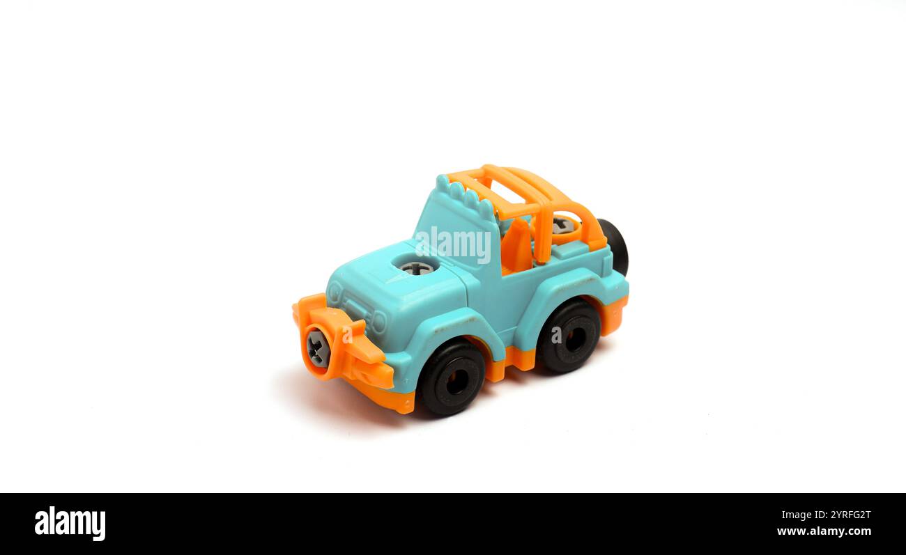 Plastic Toy Cars In Turquoise And Orange, Isolated On White Background ...