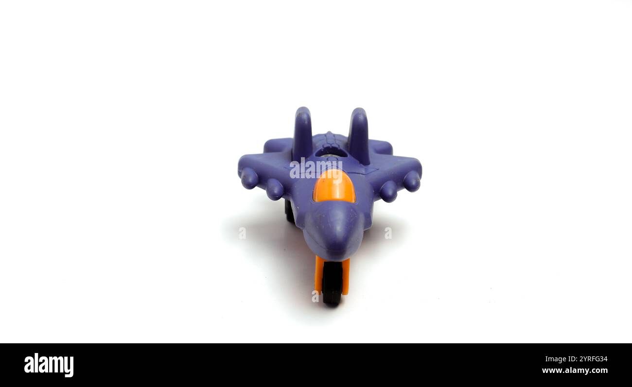 A Plastic Toy Fighter Plane For Children On Isolated White Background ...