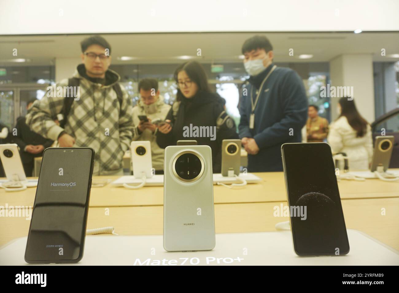 HANGZHOU, CHINA - DECEMBER 4, 2024 - Customers buy Mate 70 series ...