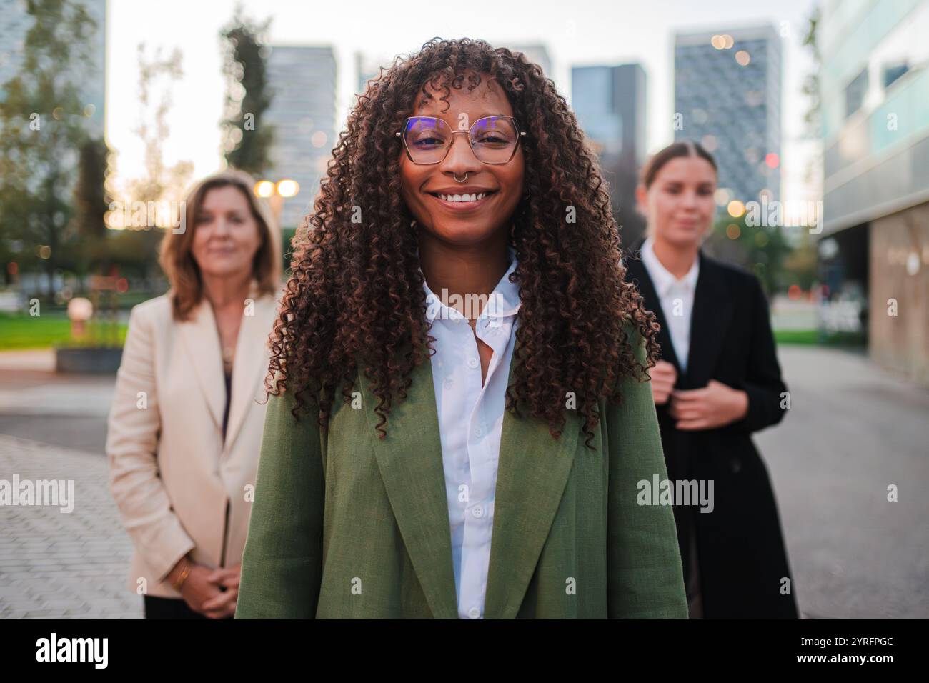 Group of only confident businesswomen standing outdoors. Entrepreneur ...