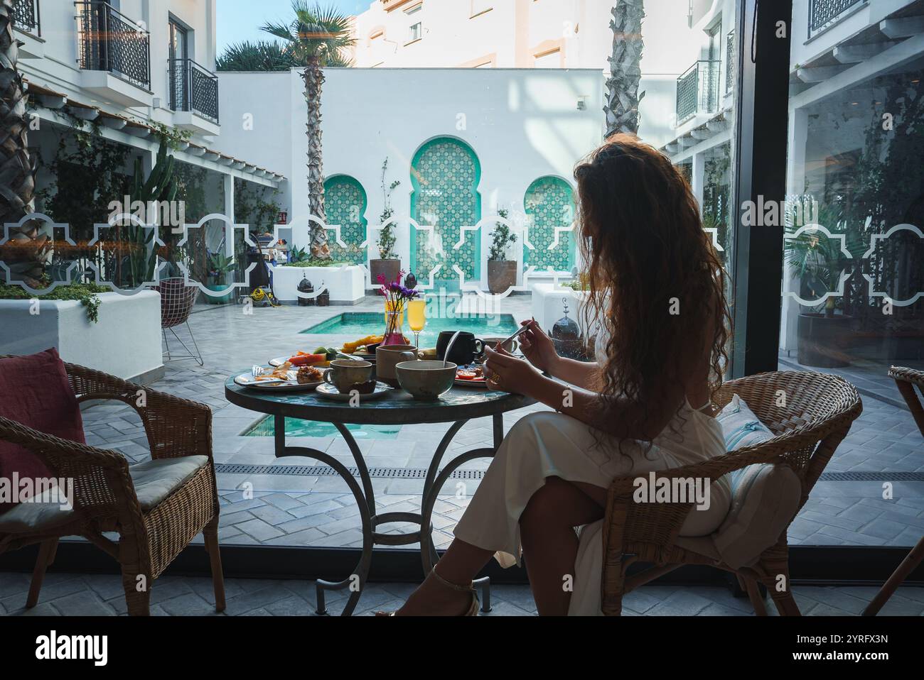 Luxurious Marrakech Style Courtyard with Pool and Dining Scene Stock ...