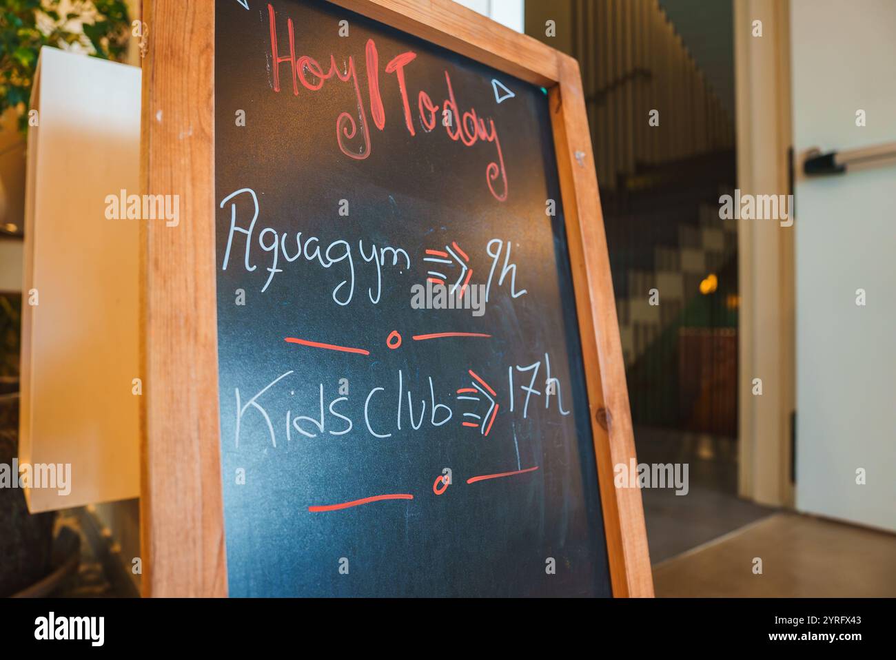 Chalkboard Sign with Activity Schedule at Marrakech Style Hotel Stock ...