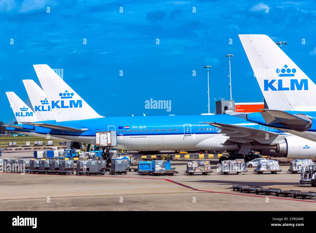 KLM planes loading on tarmac at Schipol International Airport ...