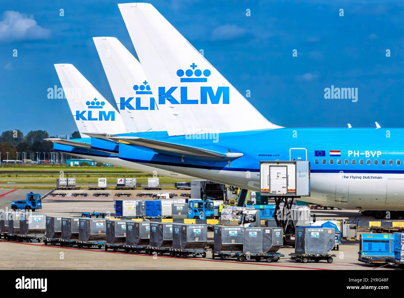 KLM planes loading on tarmac at Schipol International Airport ...
