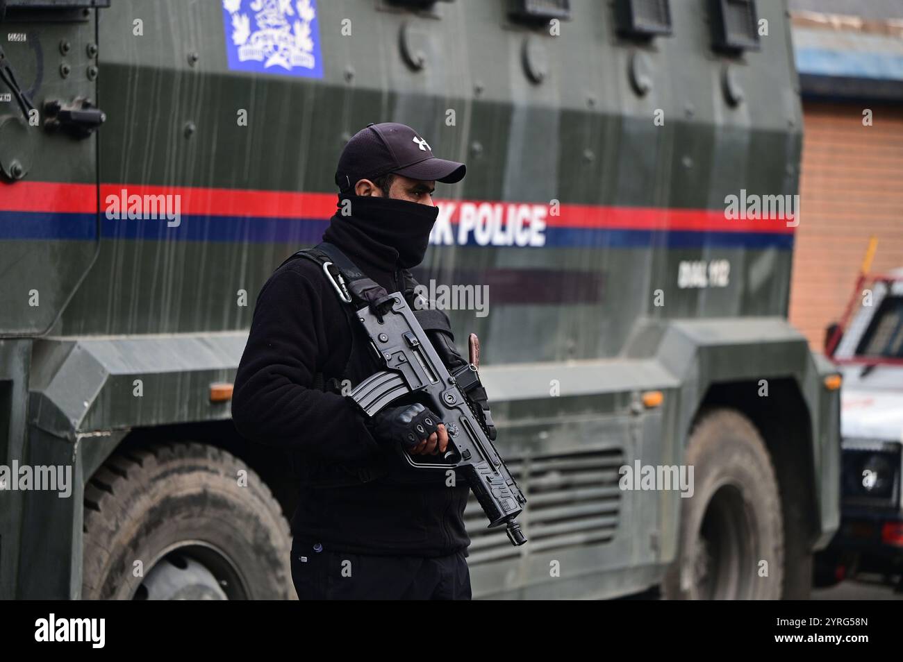 SRINAGAR, INDIA - DECEMBER 3: Policemen of Special Operation Group (SOG ...