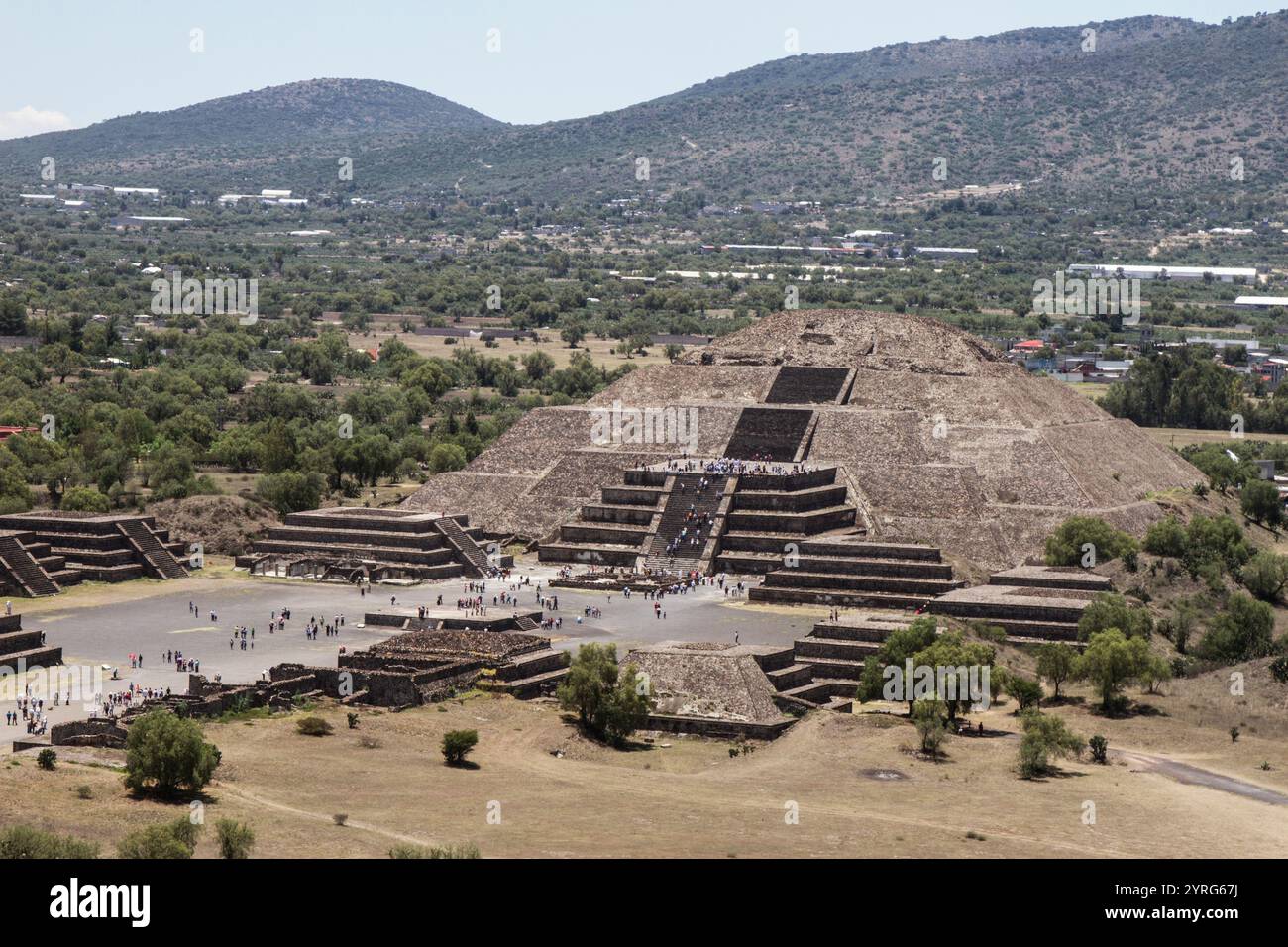 The landscape of the pyramids of Teotihuacan on a sunny and crowded day ...