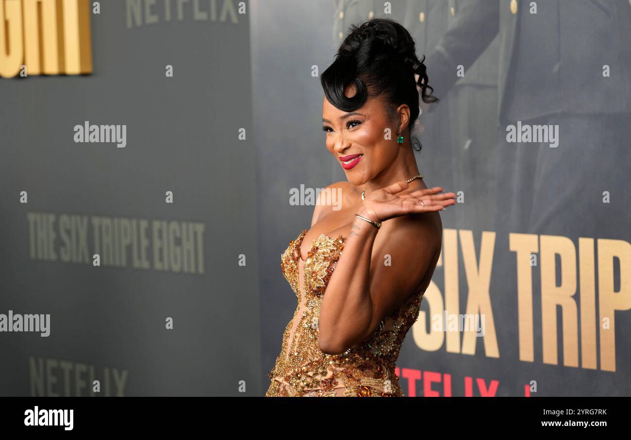 Pepi Sonuga, a cast member in "The Six Triple Eight," waves to ...