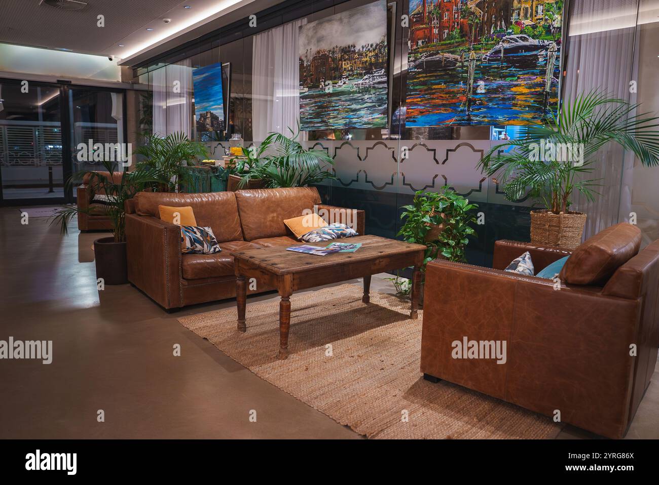 Luxurious Marrakech Style Hotel Lobby with Leather Sofas and Art Stock ...