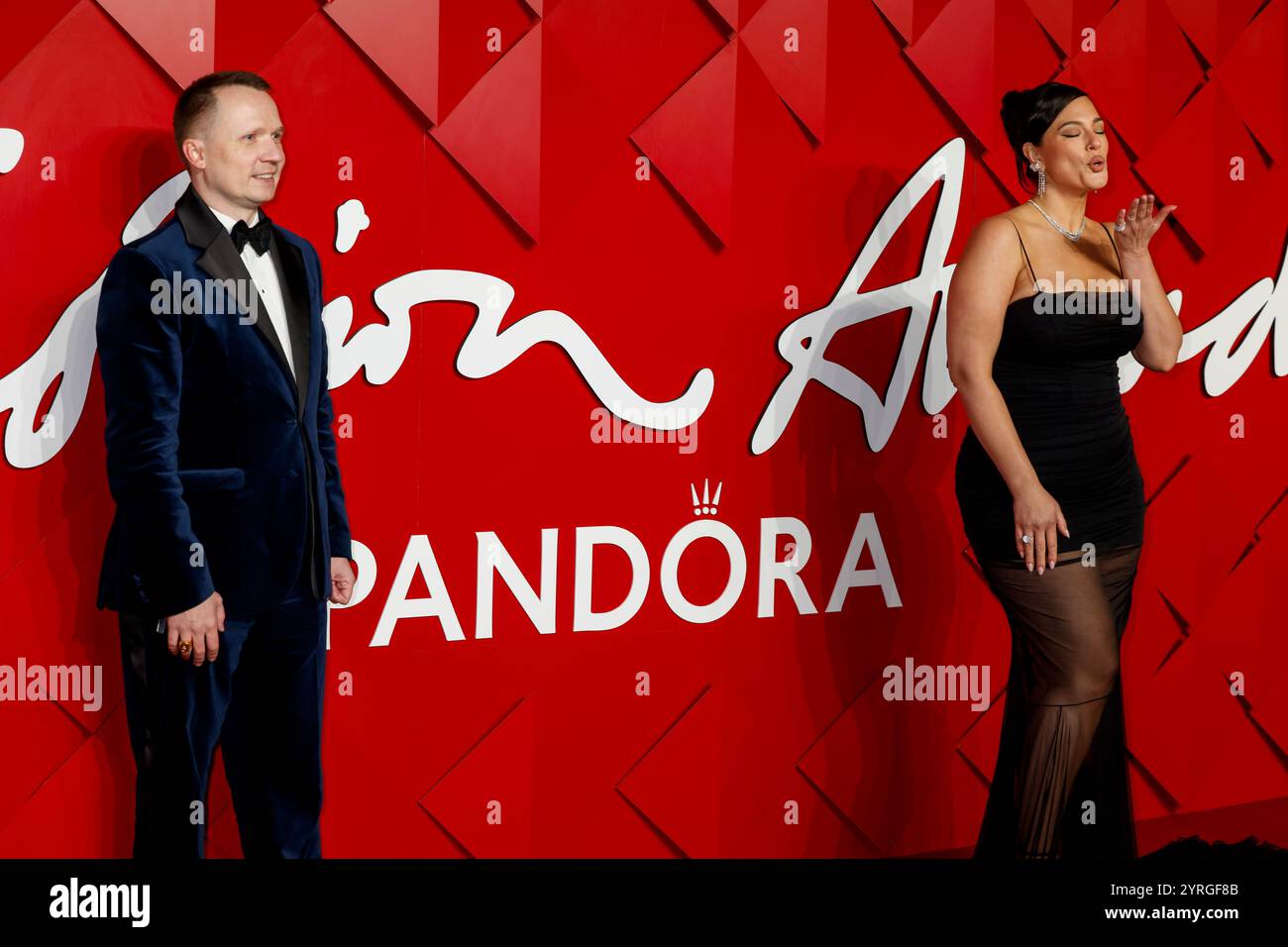 London, UK. 02nd Dec, 2024. Alexei Bez and Ashley Graham attends The ...